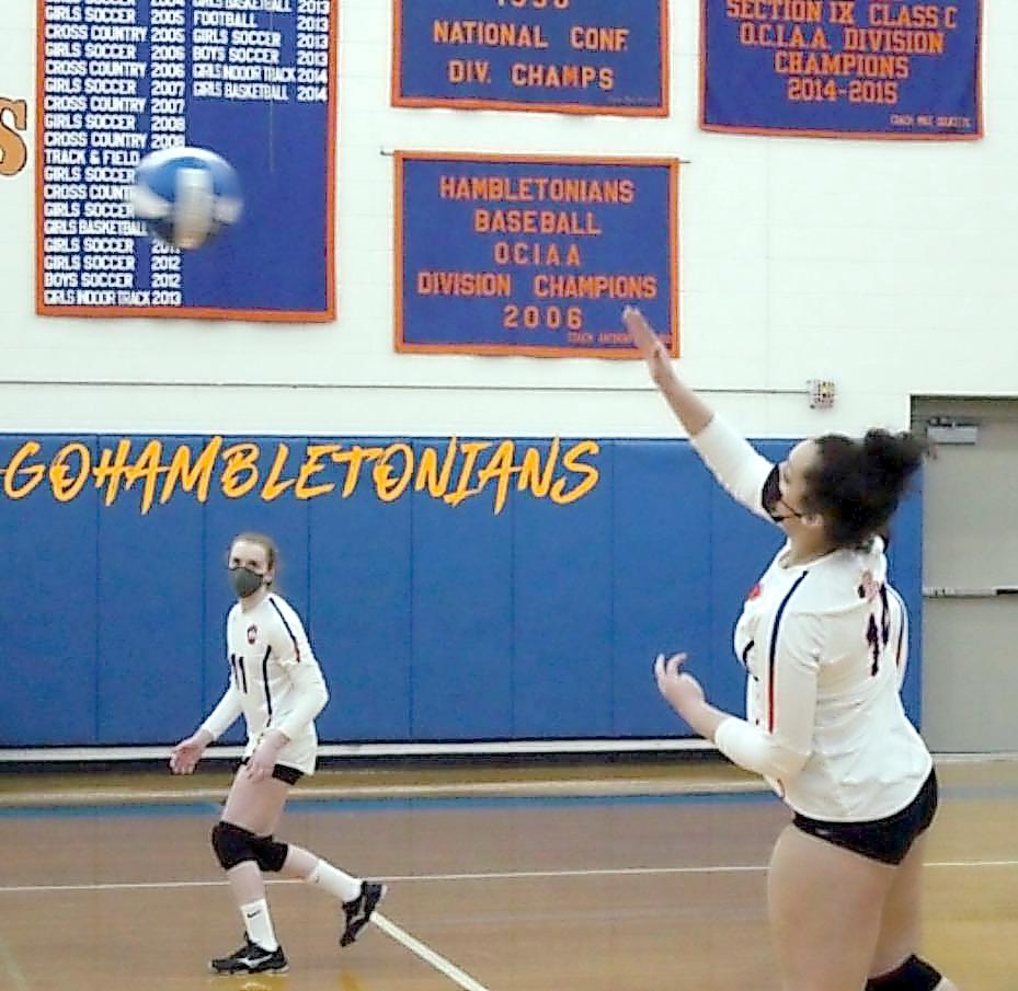 Chester Academy Volleyball captain Trinity Delgado is helping her coach ...