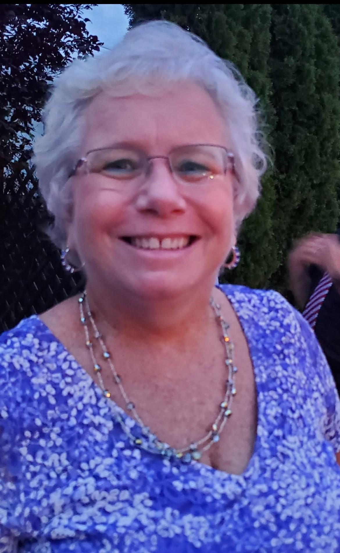 PATRICIA E. HAND