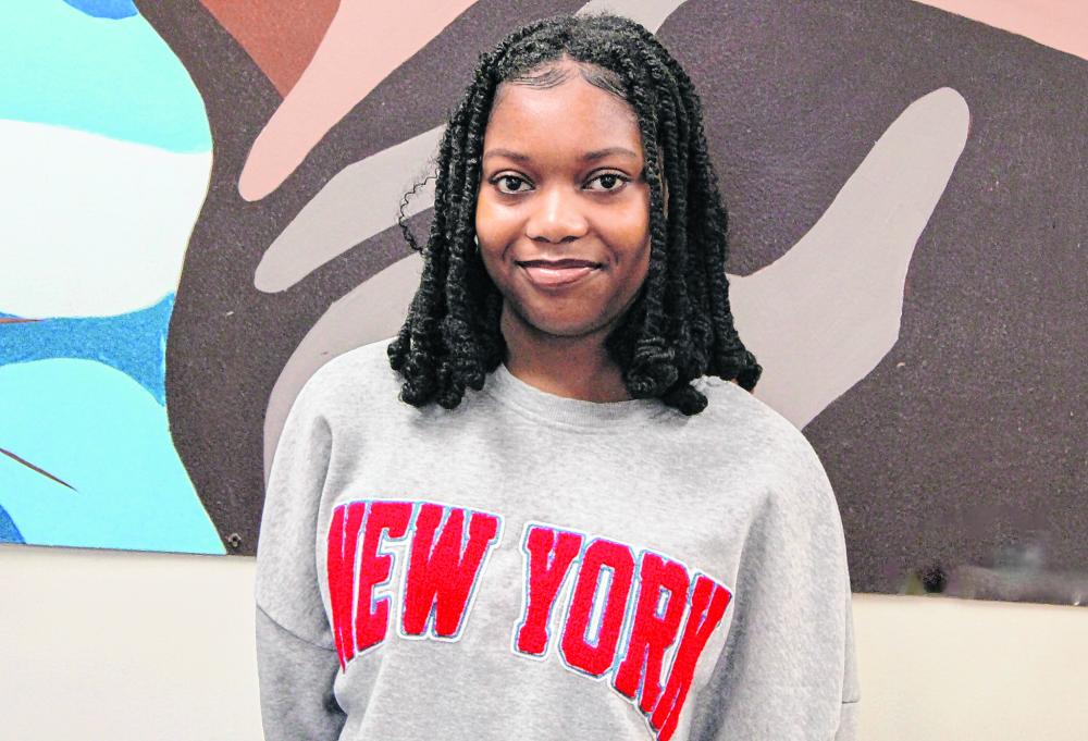 Imani Curtis engaging students, teachers on the Board of Education