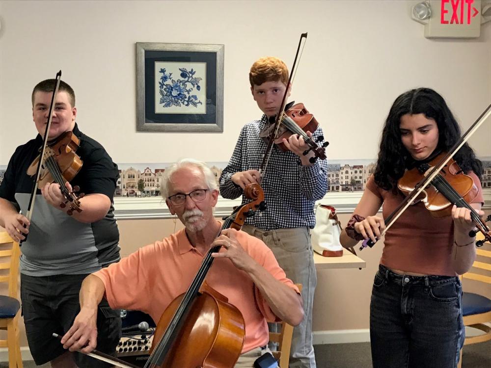 Music students and teachers play Bach and Vivaldi sociably for seniors