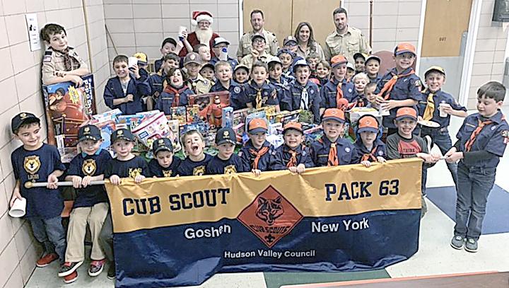 Cub Scout Pack 63 collects for Toys for Tots